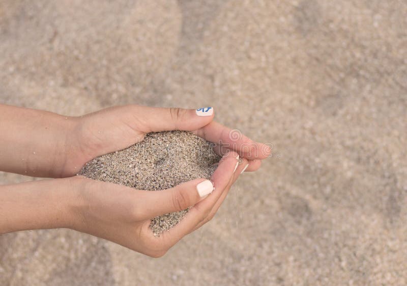 Holding sand stock photo. Image of beautiful, holding - 57702894