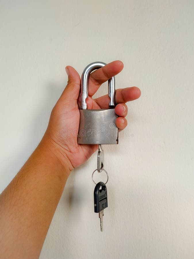 Holding a Silver Color Lock is Unlocked with Keys Stock Image - Image ...