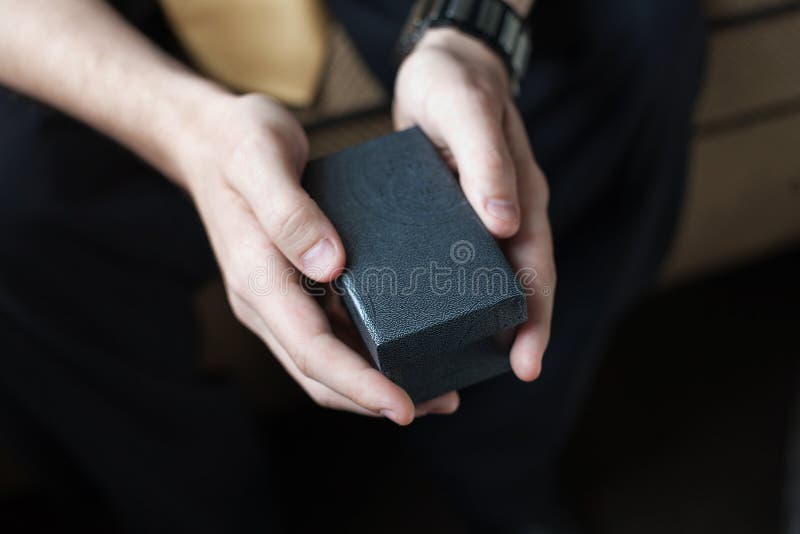 Holding small gift box stock photo. Image of nail, hand - 77590426