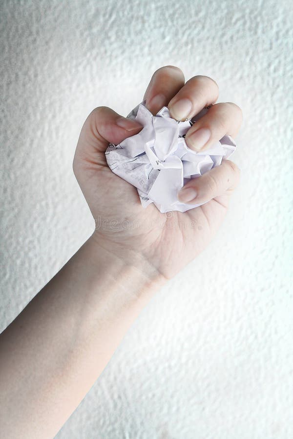 Holding a squeeze paper stock photo. Image of anger, squeeze - 26823266