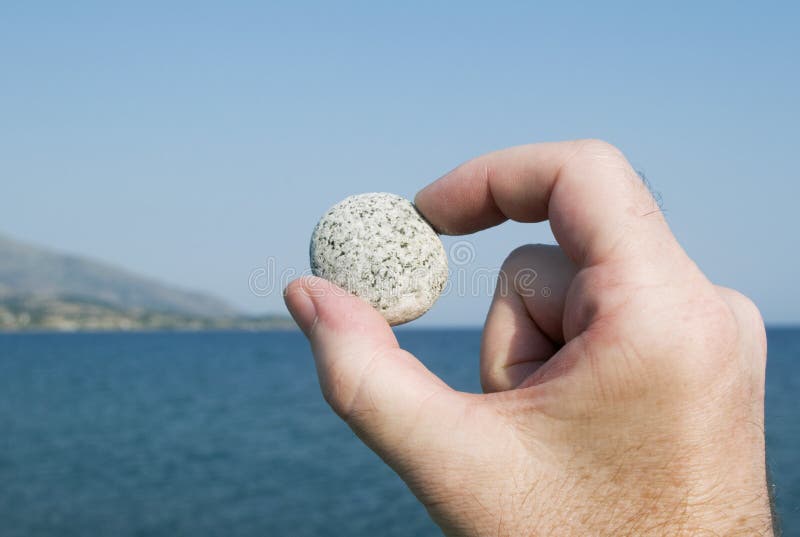 Holding stone stock image. Image of person, observe, stone - 94859727