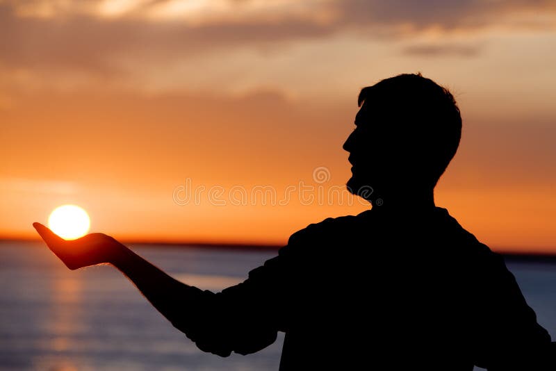 Holding the Sun stock image. Image of grasp, framing, peaceful - 9333655