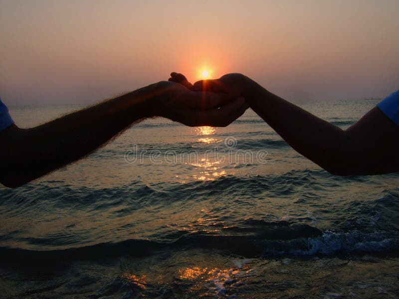 Holding the sun stock image. Image of arms, holding, mobile - 42705317