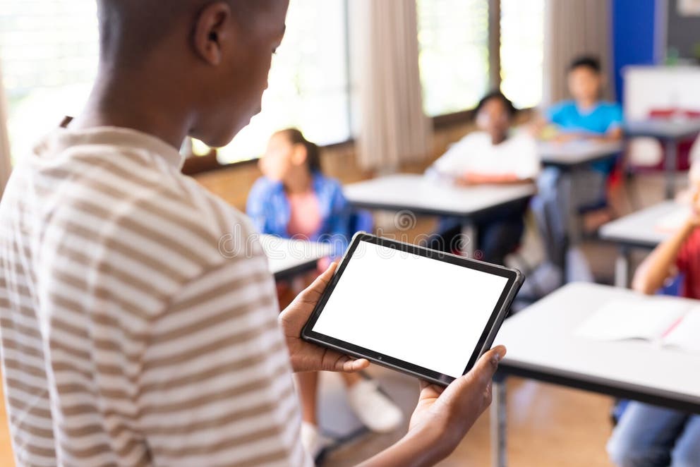 Holding Tablet, Student Presenting To Classmates in School Classroom ...