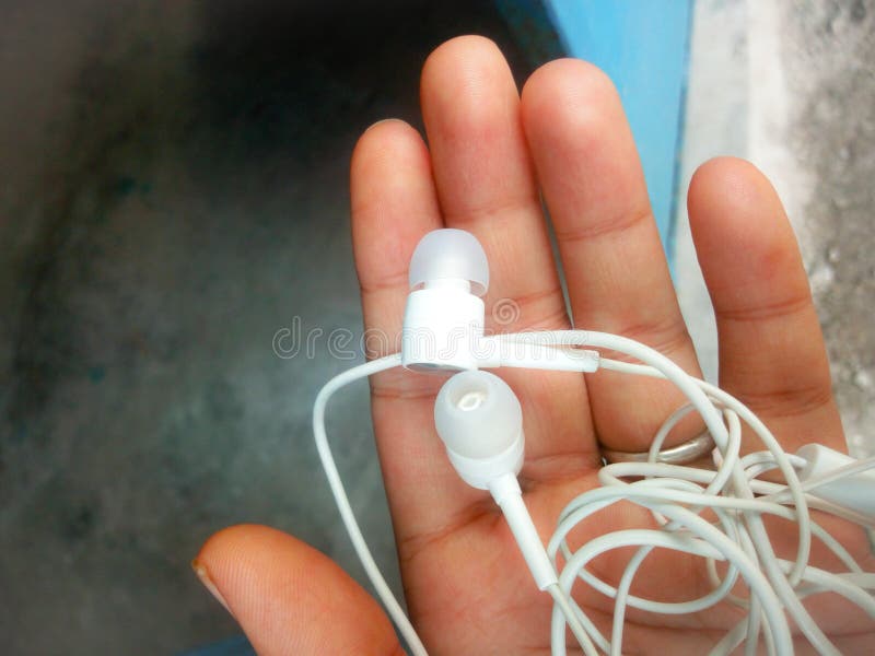 Earphone stock photo. Image of earphone, headset, hand - 105950308