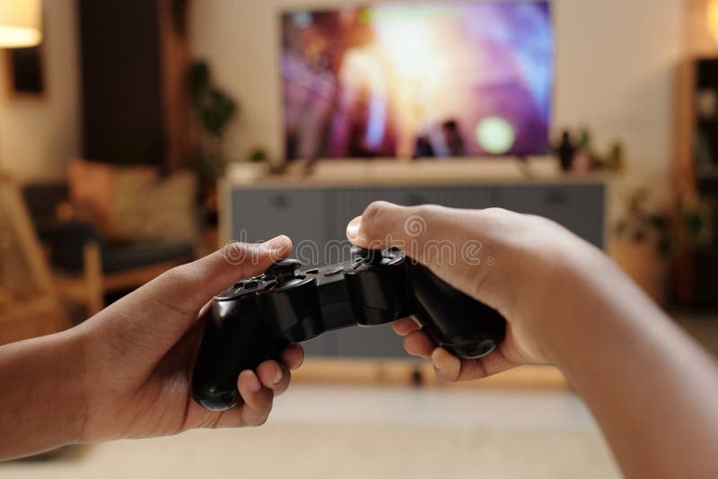 Holding Video Game Controller and Watching TV Screen Stock Photo ...