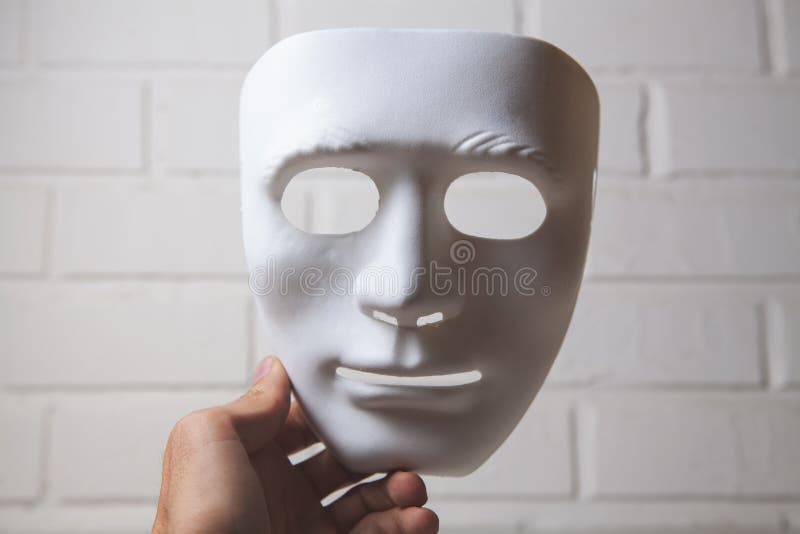 Holding a White Anonymous Mask Stock Photo - Image of disguise ...