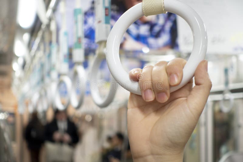 Holding Your Hand with Ring while Train Transportation for Safety Stock ...