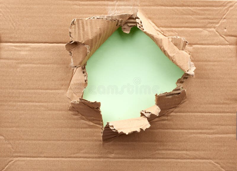 Hole in Brown Cardboard Paper with Torn and Curved Edges Stock Image ...