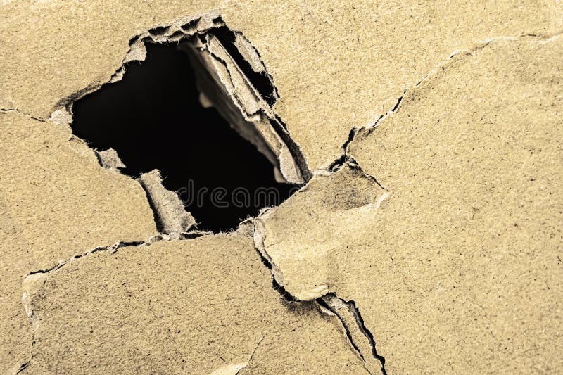 Hole of brown parcel box stock image. Image of reveal - 350870499