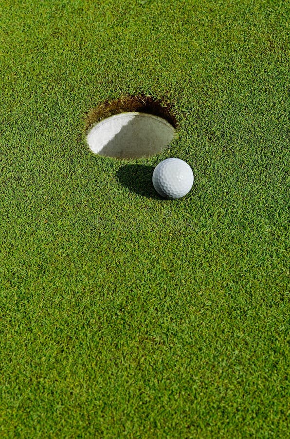 Into the hole stock image. Image of grass, hole, golf - 109091459