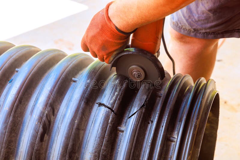 Hole is Cut in a Black Plastic Polypropylene Sanitary Pipe To ...