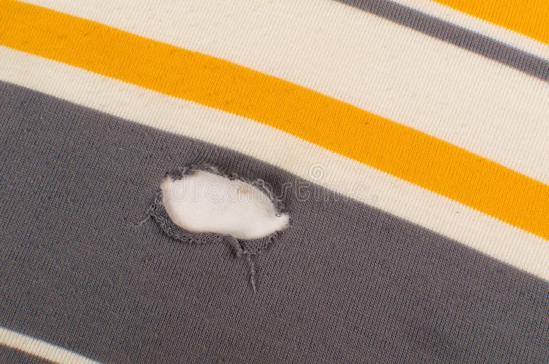 Hole in fabric stock photo. Image of shirt, hole, horizontal - 33758234