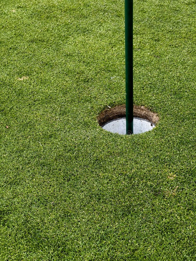 Hole on a Golf Course with a Pole Stock Image - Image of hobbies, putt ...