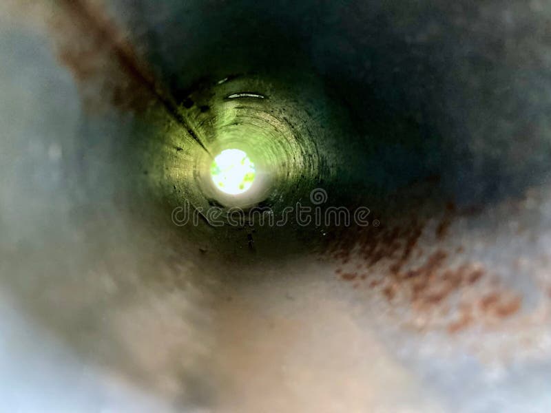 Hole inside a metal tube stock photo. Image of metallic - 256913376