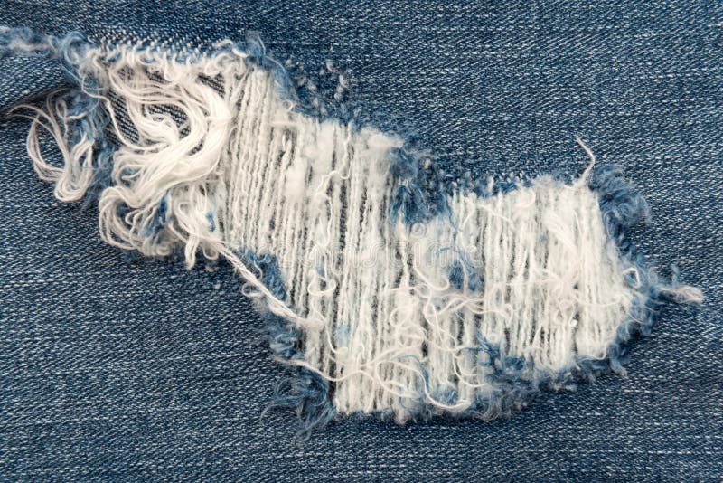 Hole in Jeans Close-up. Texture of Faded Denim Stock Photo - Image of ...