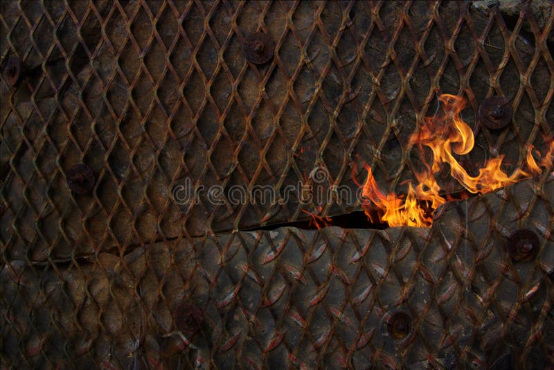 Hole in a metal with fire stock photo. Image of industry - 51146978