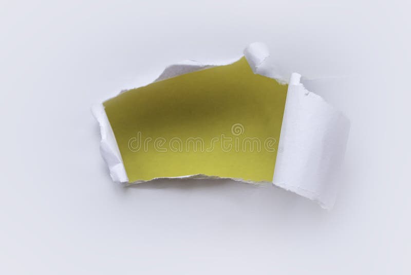 A Hole of Paper Ripped and Torn. Reveal a Yellow Wall Behind Stock ...