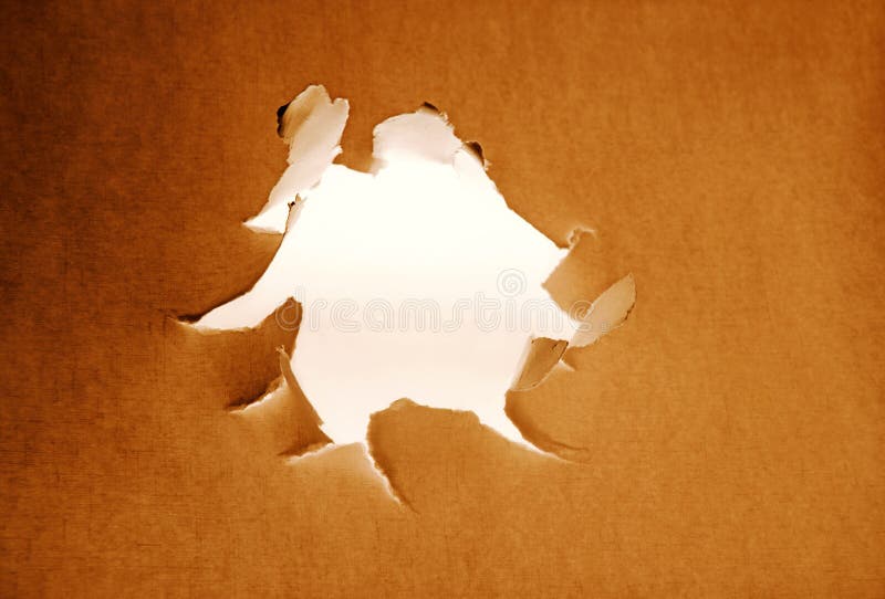 Hole Punched in a Paper Sheet Stock Photo - Image of curl, discovery ...
