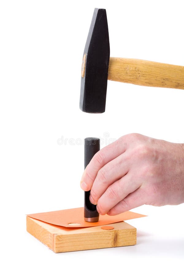 Hole punching in paper stock image. Image of puncher - 54115687