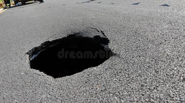 Hole in the road stock image. Image of hole, damage, civil - 15631059