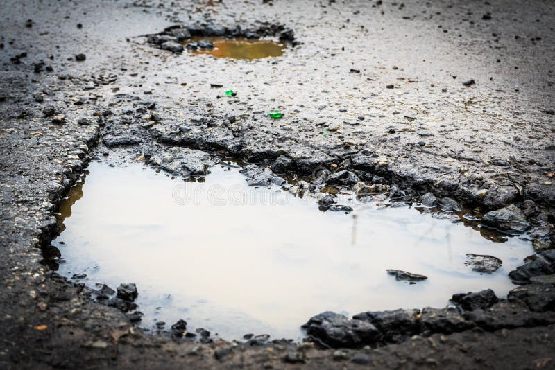 The Hole in the Road. Asphalt with Defects Stock Image - Image of ...
