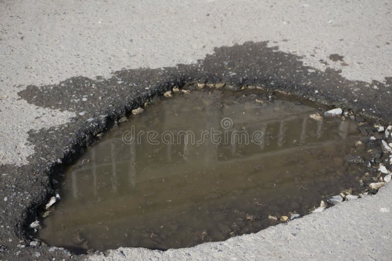 The Hole in the Road, a Hole in the Asphalt Stock Photo - Image of ...