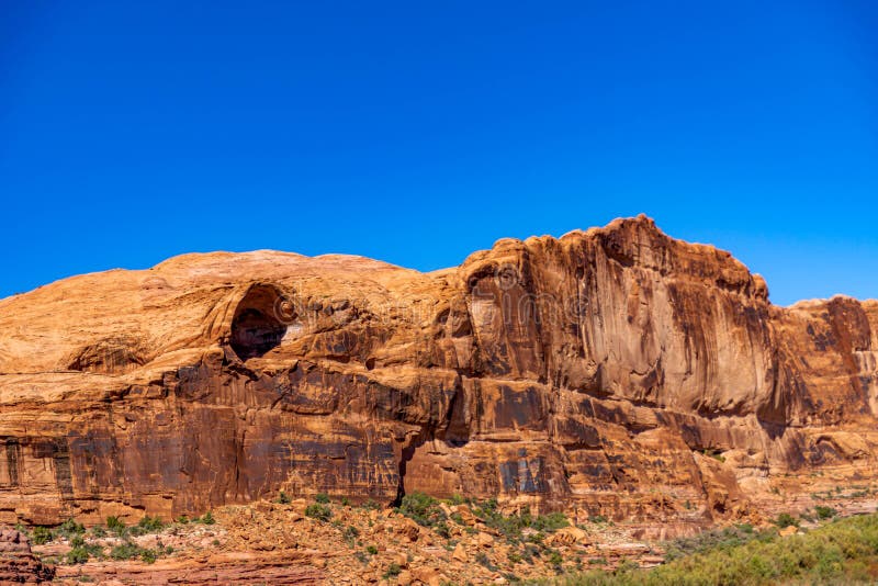 Hole in the Rock stock photo. Image of arch, butte, landscape - 259144616