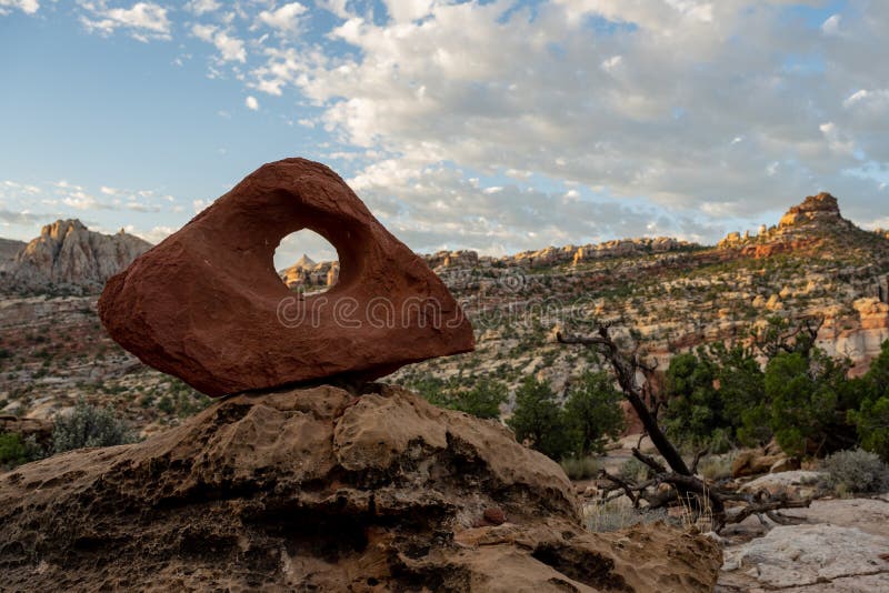 Hole in Rock Frames Formation in Distance Stock Image - Image of ...