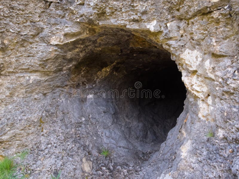 Hole in the stone cave stock photo. Image of history - 302708450
