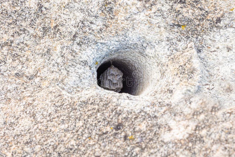 Hole in the stone wall stock image. Image of granite - 259642295
