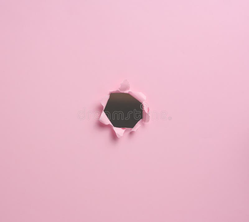 Hole with Torn Edges in Pink Paper, Full Frame Stock Image - Image of ...