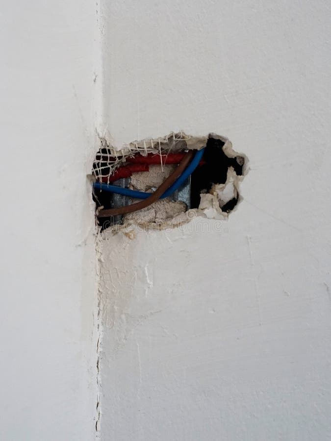 Hole in the Wall with Visible Cables in it Stock Photo - Image of volt ...