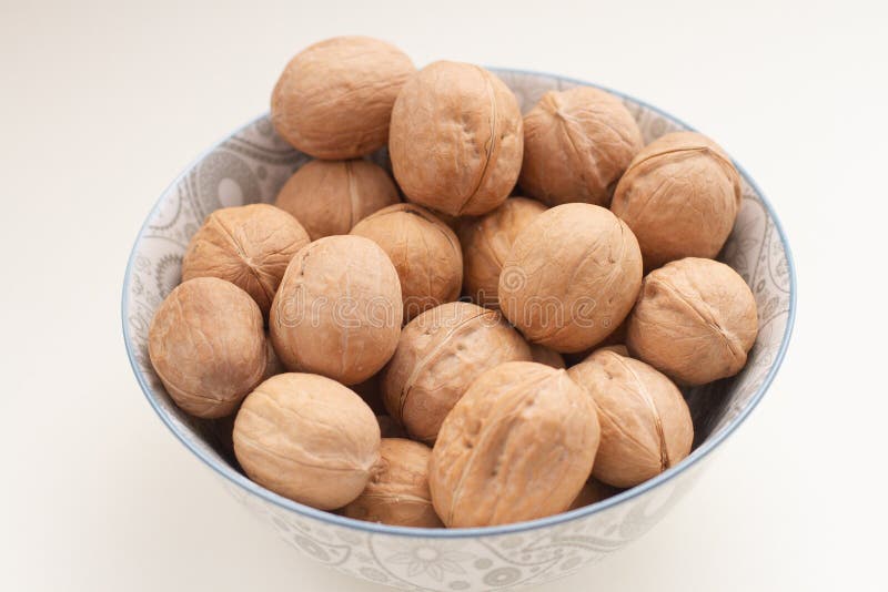 Hole Walnut in a Bowl. Not Open Nuts in Shell Stock Photo - Image of ...