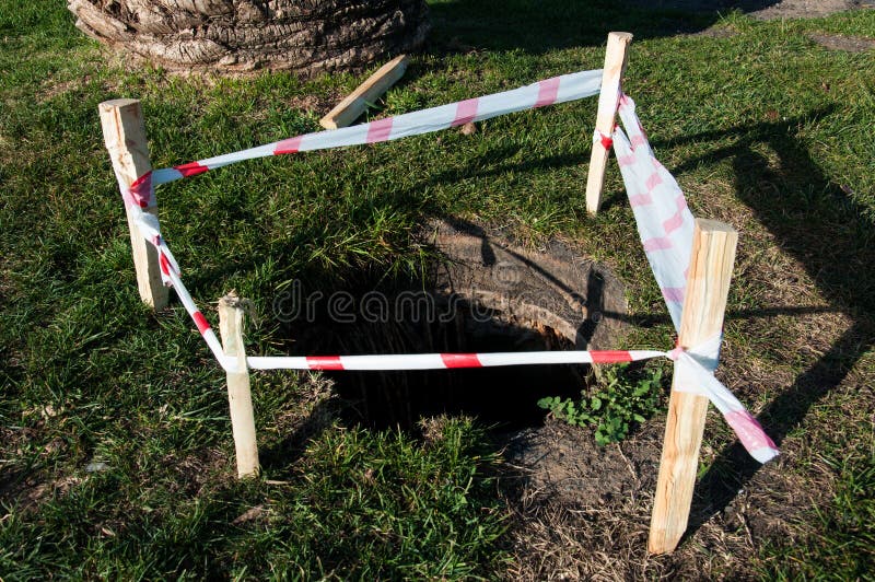 Hole with Warning stock photo. Image of landscape, sign - 36890202