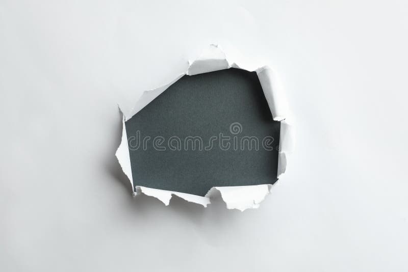 Hole in White Paper on Black Background Stock Image - Image of backdrop ...
