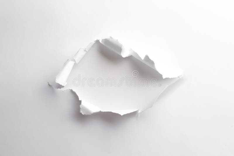 Hole in White Paper on Light Background Stock Photo - Image of ...
