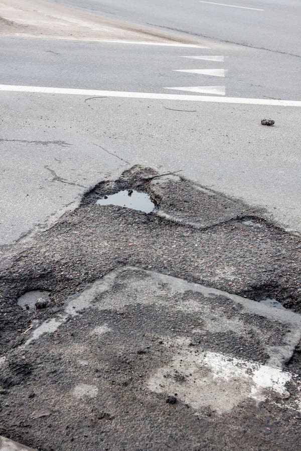 Pot holes in road stock image. Image of damage, danger - 60728755