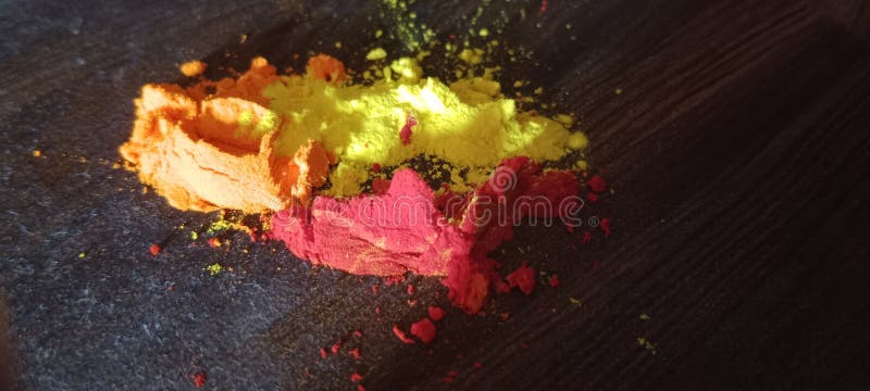 Holi colour on the table. stock photo. Image of yellow - 274040214