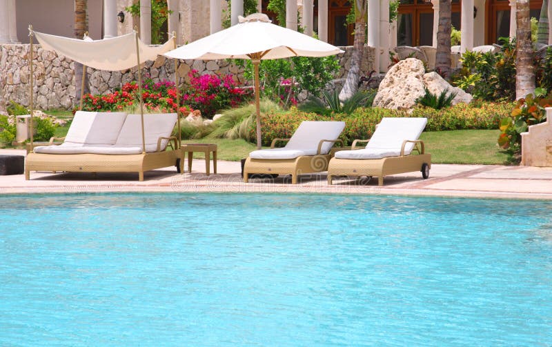 Swimming Pool with Bali Type Hut and Beach Stock Photo - Image of ocean ...