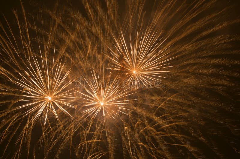 Holiday Background: Orange Fireworks in Night Sky Stock Photo - Image ...