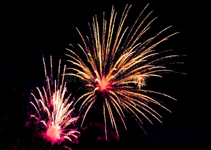 Holiday, Celebration - Two Flashes of Colorful Fireworks in the Stock ...