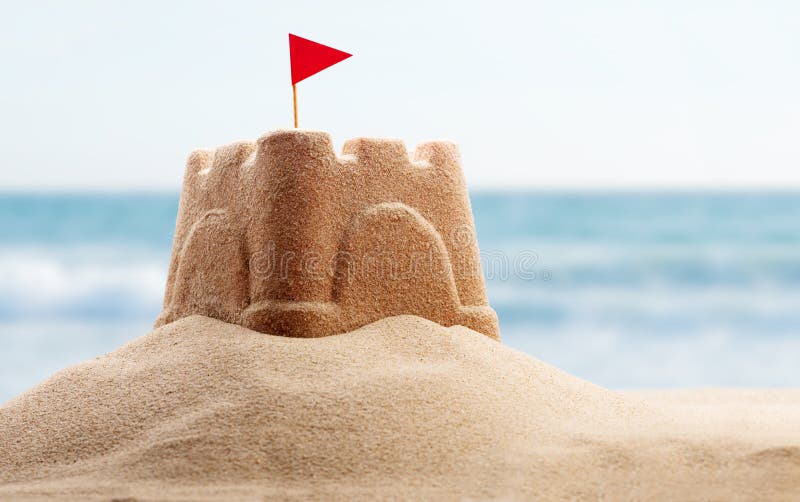 Pyramid Shaped Sand Castle stock photo. Image of sand - 3415540