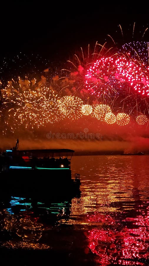 Holiday Firework in the Night Sky Over a City Stock Image - Image of ...