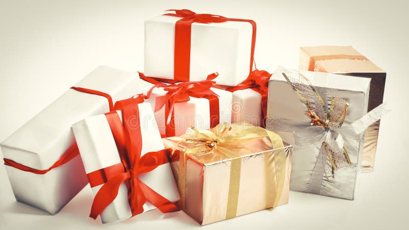 Holiday Gift Boxes Decorated with Ribbon Isolated on White Background ...