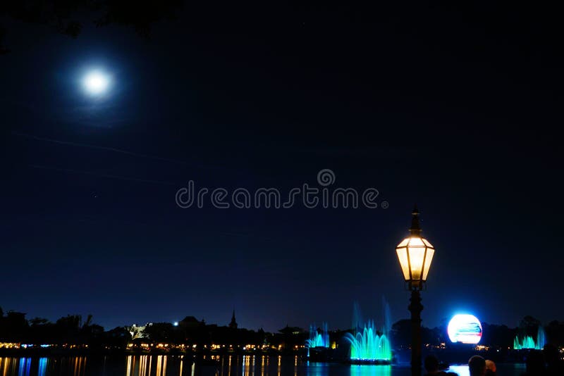 Holiday Light, Tree and Moon Stock Photo - Image of gold, epcot: 135255440
