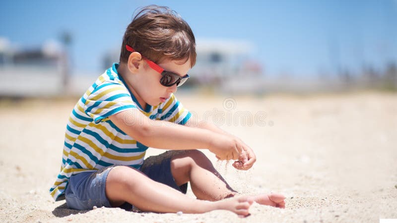 Holiday, Little Boy Three Years Old Fun Digging in the Sand at the ...