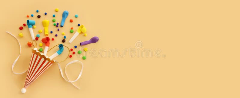 Holiday Party Image Over Yellow Background. View from Above Stock Photo ...