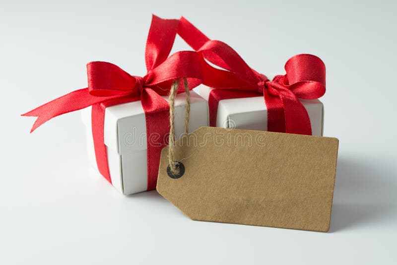 Holiday Presents with Empty Tag Stock Image - Image of present, giving ...