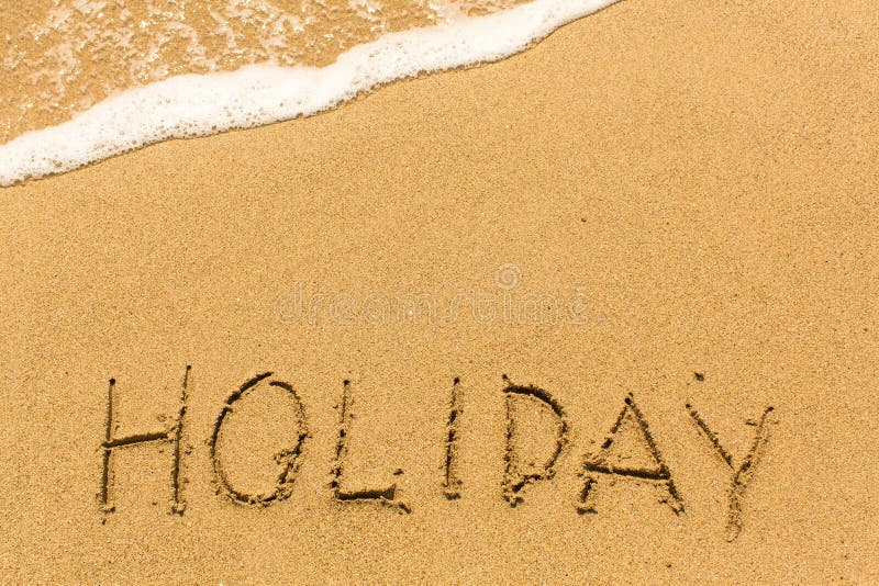 Holiday - Word Drawn on the Sand Beach Stock Image - Image of sand ...